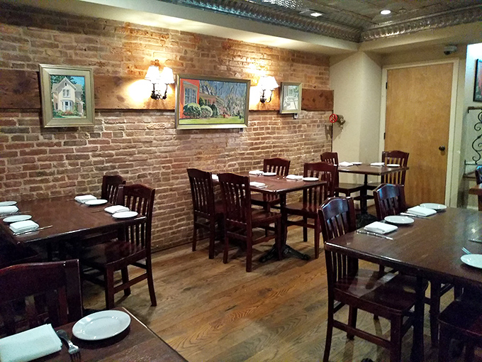Another dining area where exposed brick and simple furnishings let the food take center stage&mdash;no distractions from what matters most.