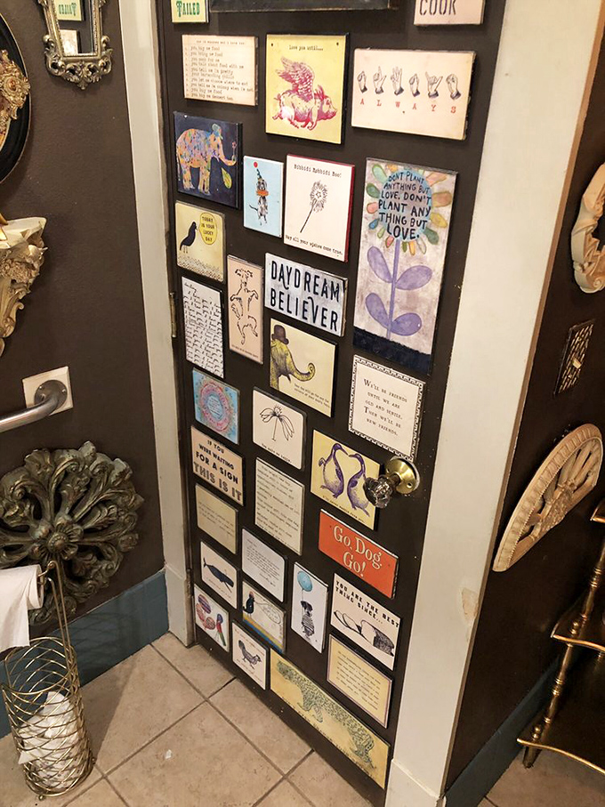 The bathroom door doubles as an inspiration board—because sometimes the best pep talks happen between coffee refills and the check.