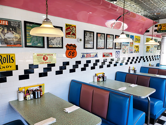 Vintage signs and memorabilia line the walls, telling stories of American road trips and simpler times when diners were the original social networks.