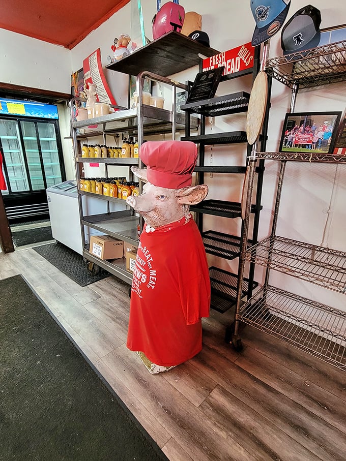 The whimsical pig chef statue stands guard over shelves of Polish provisions&mdash;a silent sentinel ensuring traditions remain unbroken and delicious.
