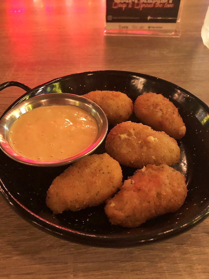 These aren't your average jalapeño poppers—they're little golden grenades of flavor, ready to explode with creamy goodness at first bite.