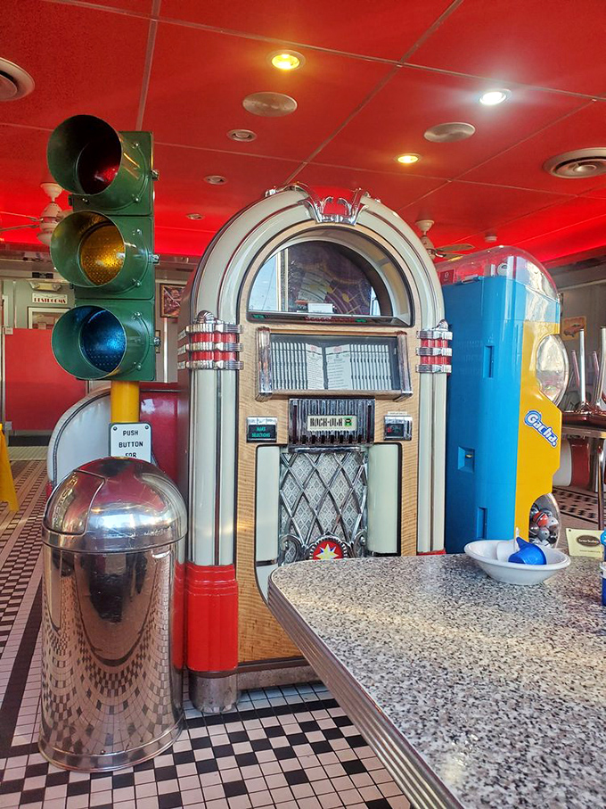 The vintage jukebox and traffic light aren't just decorations &ndash; they're time machines that transport you to an era when rock was young and milkshakes ruled.