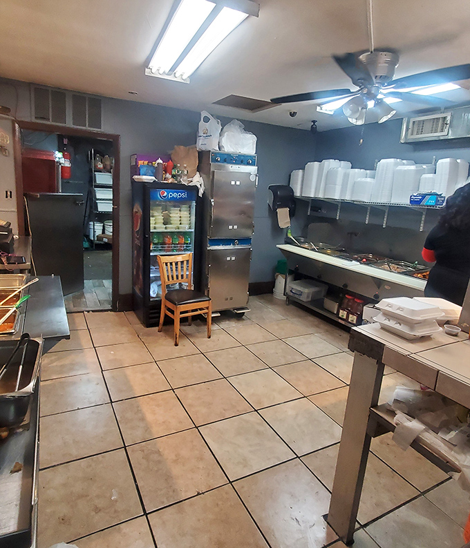 Behind the scenes, this modest kitchen cranks out flavors that transport diners straight to the islands.