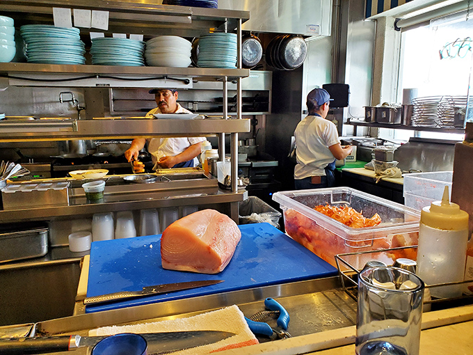 In the open kitchen, chefs transform the ocean's bounty with practiced precision&mdash;a delicious performance art that ends on your plate.