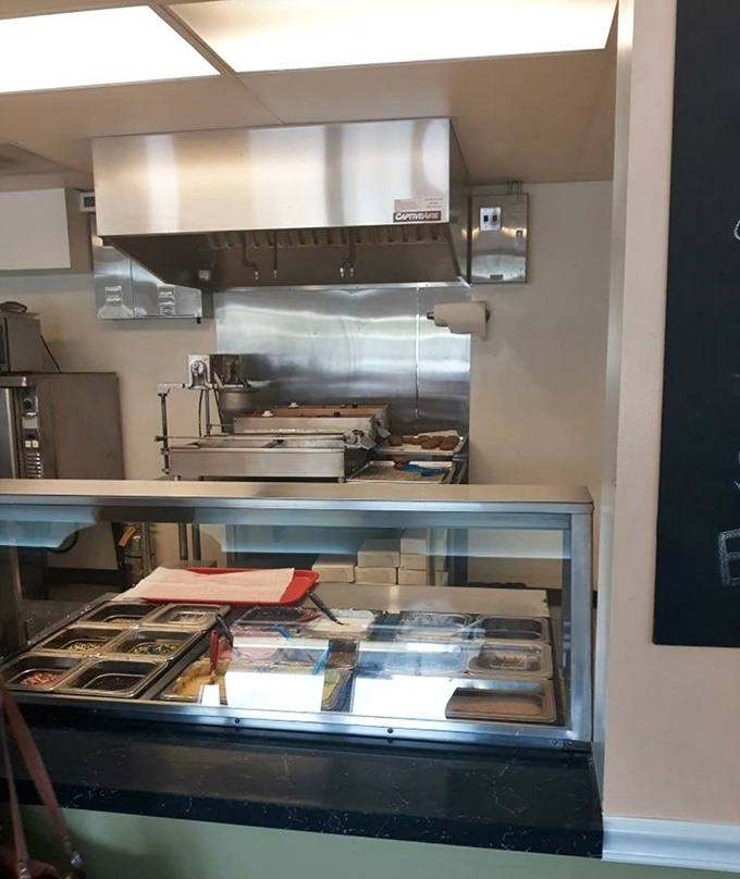 The kitchen window offers a glimpse into the alchemist's lab where ordinary ingredients transform into extraordinary treats.