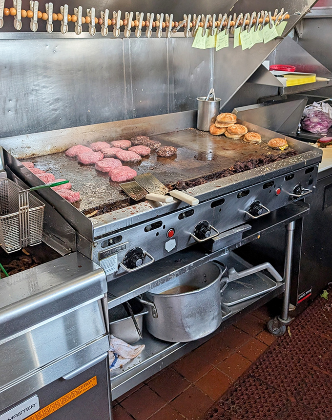 Behind-the-scenes magic where burger dreams become reality. That well-seasoned flat-top grill has probably cooked more perfect patties than most chefs have plated entrees.