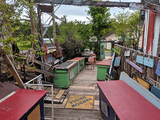 Nautical meets whimsical in this outdoor seating area. The benches may not match, but that's precisely the point at this celebration of beautiful chaos.