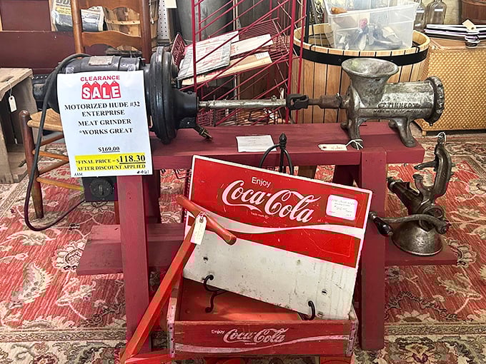 This motorized meat grinder and Coca-Cola memorabilia create the perfect vignette of mid-century American kitchen industriousness.