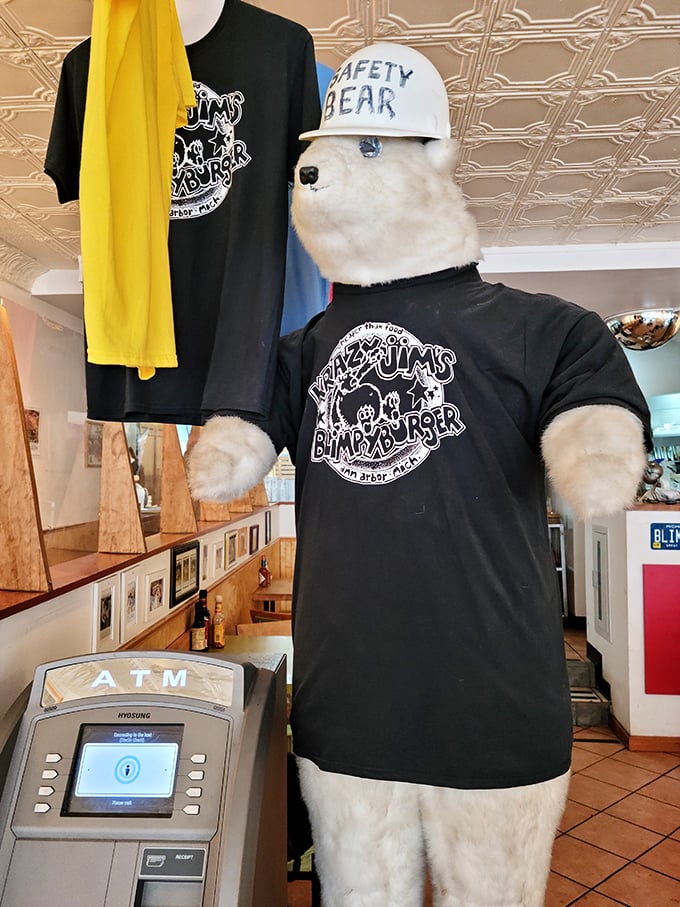 Meet the Blimpy mascot, sporting his "Safety Bear" hat and ready for burger duty. He's the silent guardian of proper ordering procedure.