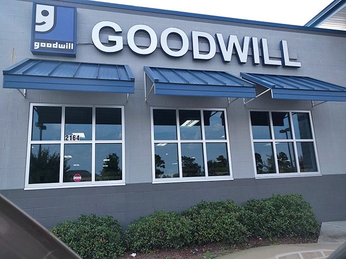 The iconic blue smile logo welcomes bargain hunters and treasure seekers alike. Behind these letters lies a world of possibility and unexpected finds.