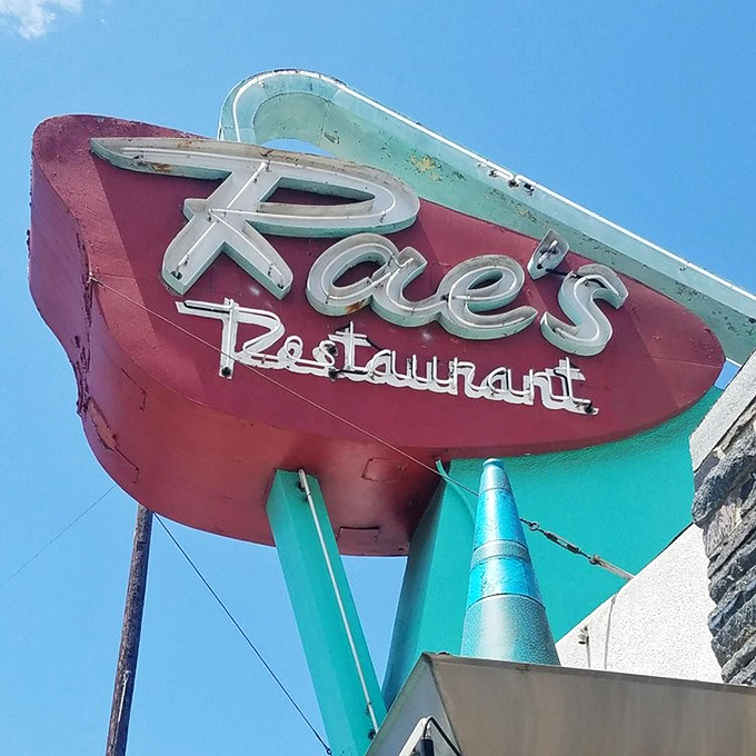 That neon sign doesn't just advertise—it beckons like an old friend waving you over for the best conversation you'll have all day.