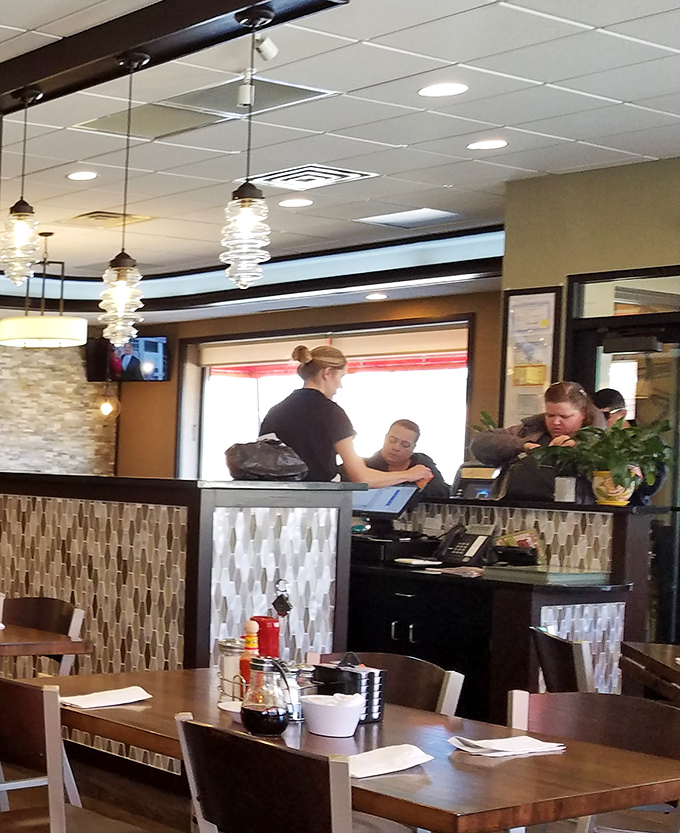 The host station&mdash;that first checkpoint on your journey to breakfast paradise, where friendly faces guide hungry pilgrims to their pancake destinations.