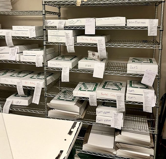 Organization is key when happiness is in such high demand. Each labeled box represents someone's moment of joy, carefully prepared and waiting for pickup.