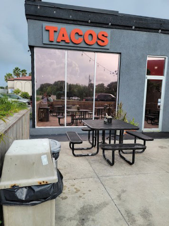 The minimalist outdoor seating area offers a front-row seat to people-watching with your taco companion.