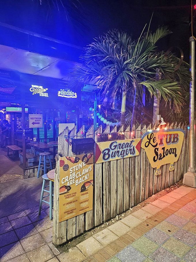 Evening lights transform this coastal gem into a magical dining destination that beckons hungry souls from miles around.