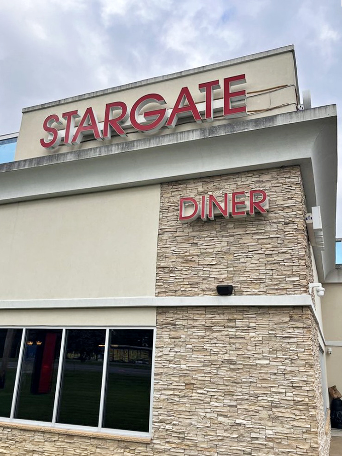 The stone facade and bold signage announce "STARGATE DINER" with confidence&mdash;no pretentious small fonts or minimalist design here.