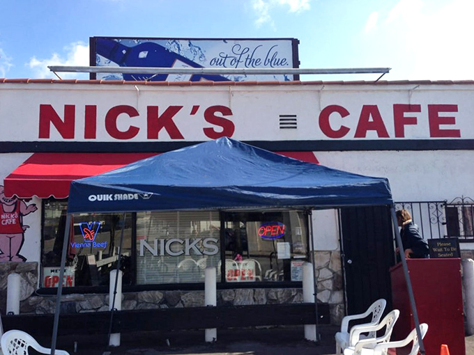 The iconic Nick's Cafe sign promises breakfast salvation to weary Angelenos. That blue awning has sheltered countless hungry souls on their pilgrimage to poached egg perfection.