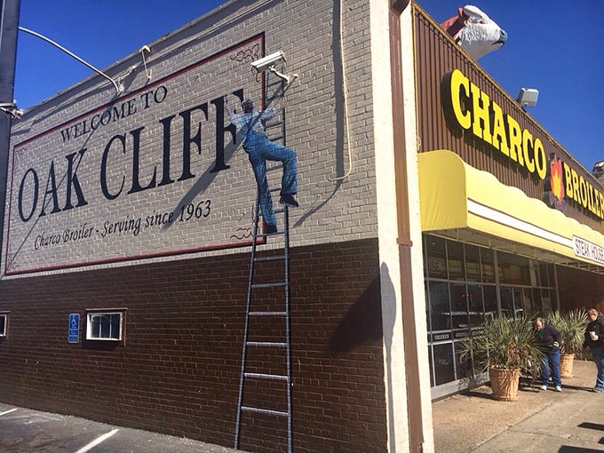 The Oak Cliff neighborhood has embraced Charco Broiler for generations. That mural tells you everything about local pride.