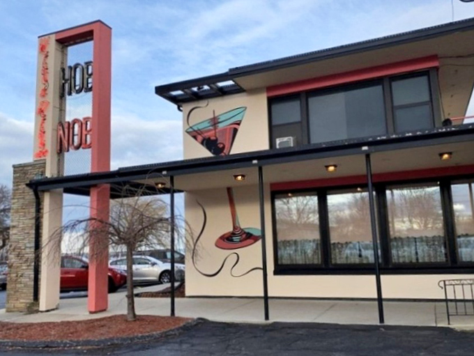 By day, HOBNOB's exterior reveals its mid-century charm &ndash; complete with martini glass artwork that sets expectations for what awaits inside.