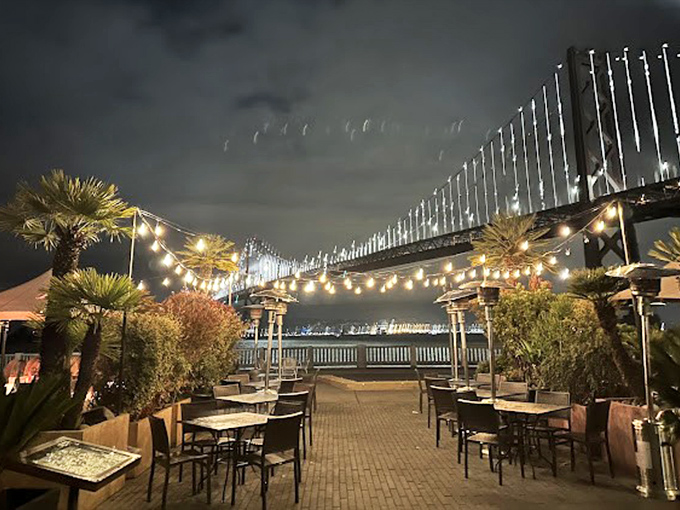 The outdoor patio after dark is where string lights compete with the Bay Bridge for who can twinkle more enchantingly. Spoiler: it's a tie.