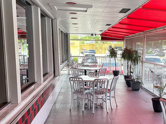 The outdoor patio&mdash;where Florida's sunshine meets diner classics, proving that some pleasures don't need air conditioning.