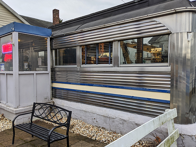 The exterior's silver siding gleams like a time machine to when meals were honest and calories didn't count if you ate them in a booth.