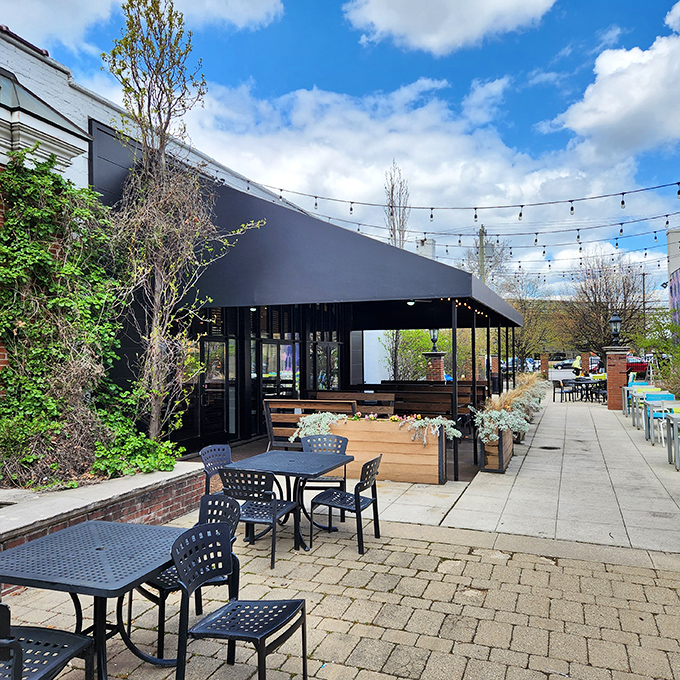 Michigan weather can be fickle, but this outdoor patio, with its string lights and fresh air, makes every day feel like patio season.