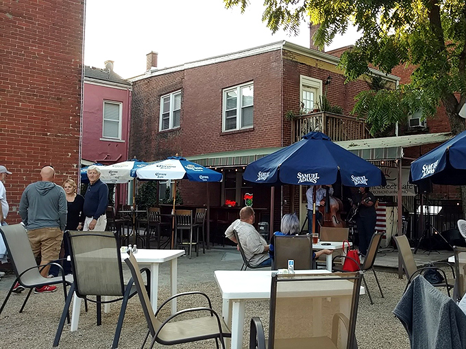 Al fresco dining with a side of small-town charm. Those blue umbrellas have witnessed countless first dates and anniversary celebrations.