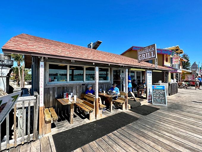 Outdoor seating where the sea breeze serves as complimentary seasoning. Some tables have million-dollar views without the price tag. 