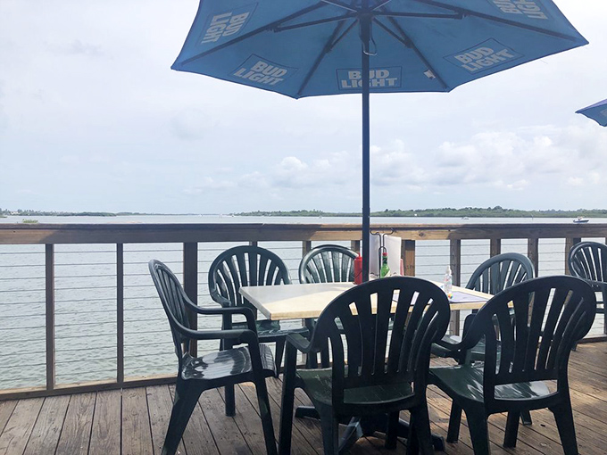 Outdoor seating where the gentle river breeze enhances every bite. This is what people dream about when they say "dining with a view."