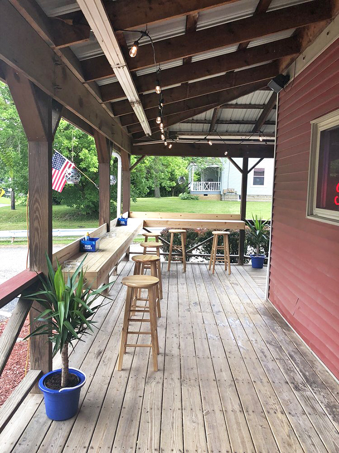 The porch where summer memories are made, complete with string lights that transform ordinary evenings into something magical.