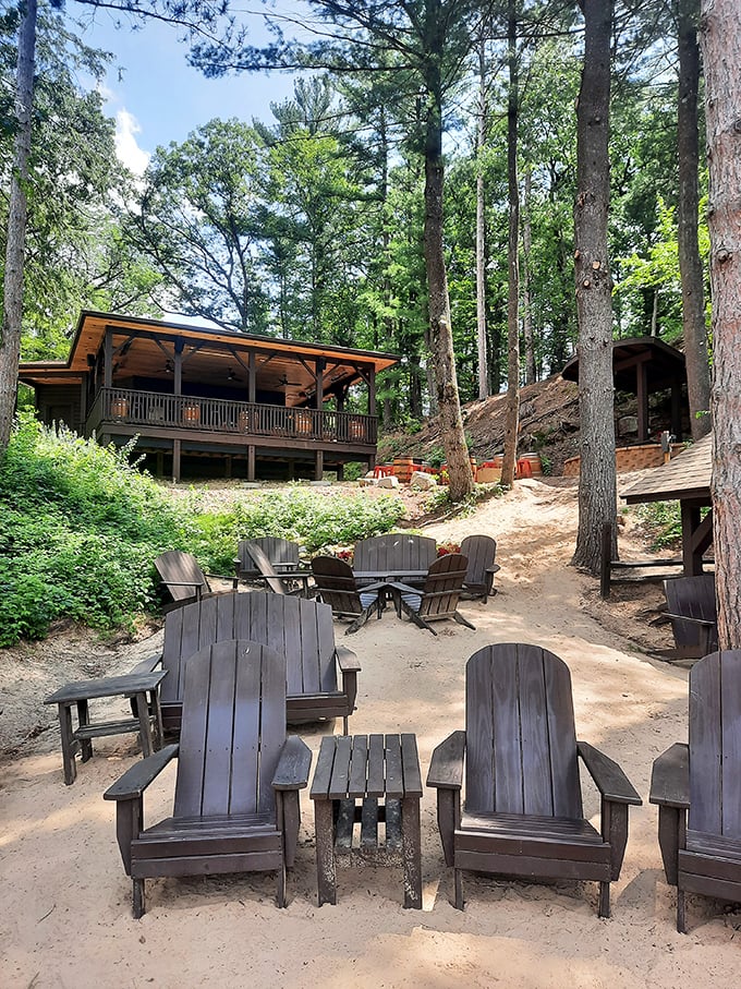 Adirondack chairs that practically whisper "sit a while" beneath towering pines. The perfect spot to digest both your meal and the day's adventures.