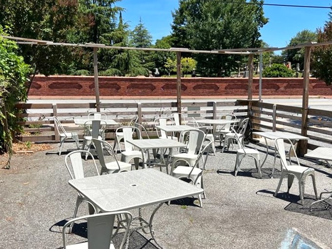 The outdoor seating area: where summer brunches stretch into afternoon conversations and strangers become friends over shared hot sauce.