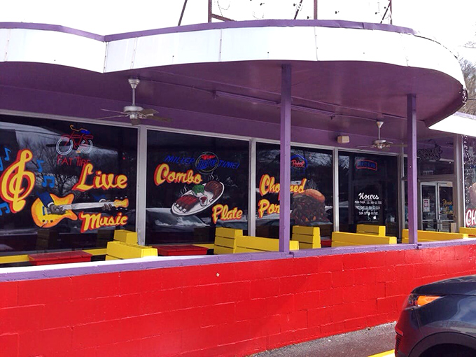 Outdoor seating where neon signs promise live music, combo plates, and the kind of evening that becomes your favorite memory.