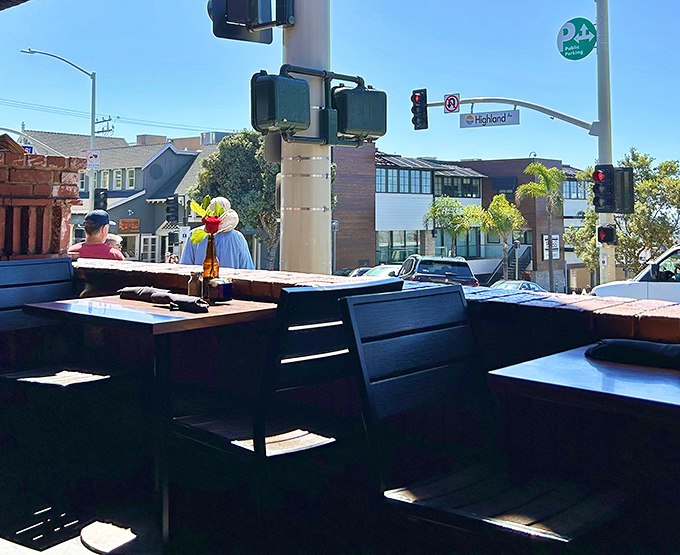 The outdoor seating area offers front-row tickets to the Manhattan Beach parade of humanity, with ocean breezes as your dining companion.