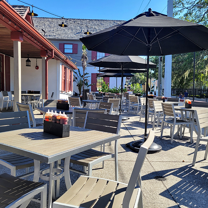 Outdoor seating that invites you to linger. Florida sunshine, gentle breezes, and the promise of BBQ create the perfect dining trifecta.