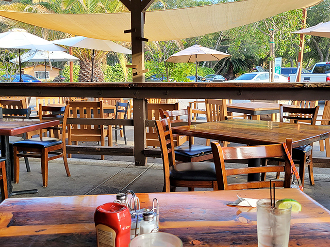 Outdoor seating that captures California's perfect weather &ndash; where every table offers a chance to dine al fresco under gentle shade sails.