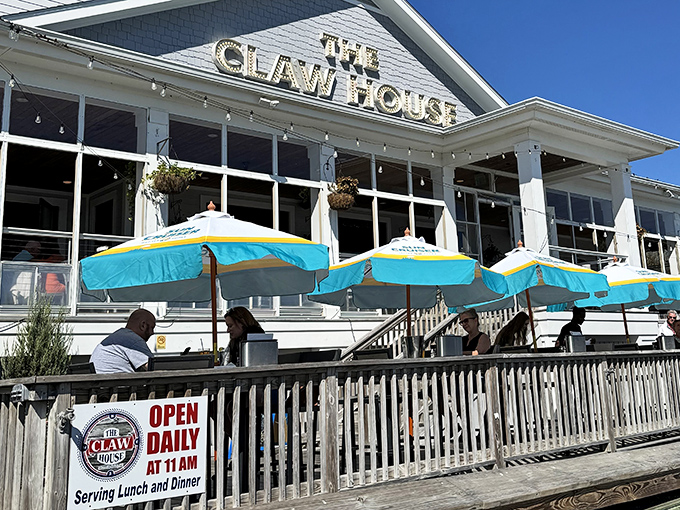The outdoor deck offers al fresco dining under cheerful umbrellas. Sea breezes included at no extra charge.