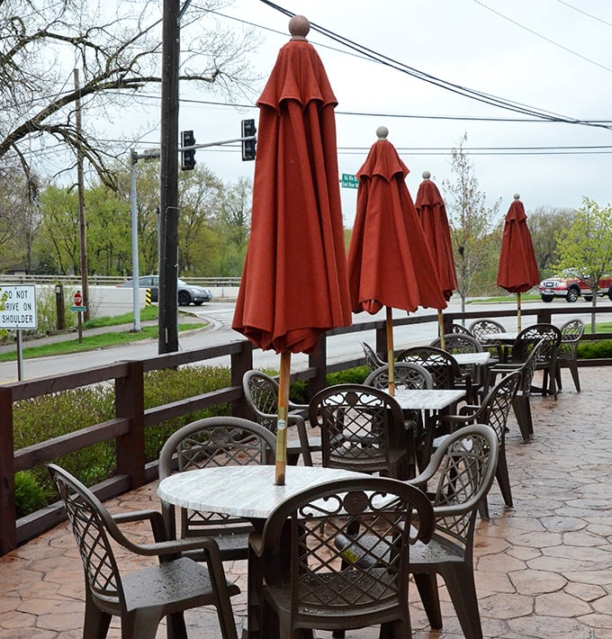 Outdoor seating for when your food coma needs fresh air. Those red umbrellas stand ready for whatever Midwestern weather arrives.