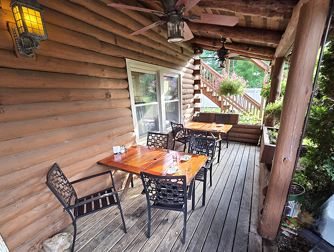 The rustic porch dining area offers a perfect summer retreat. Imagine sipping a cold Hefeweizen here while pretending you're overlooking the Alps instead of Virginia.