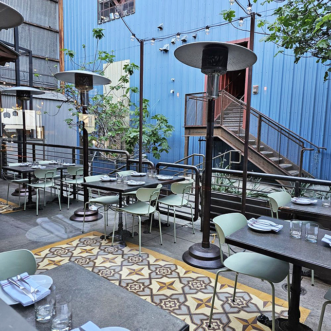 Al fresco dining with geometric tile details that would make an Instagram influencer weep with joy. The perfect LA evening awaits.