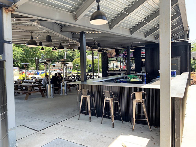 The covered outdoor space offers al fresco dining with protection from the elements &ndash; because rain shouldn't come between you and great barbecue.