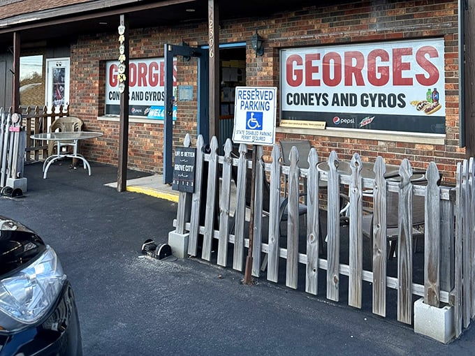 The modest patio entrance with its white picket fence says "welcome home" before you've even stepped inside.