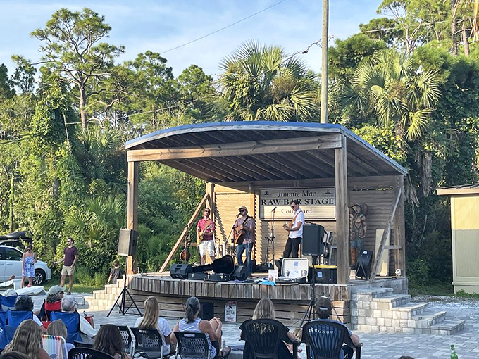 Live music under the palms adds another layer to the Indian Pass experience. Seafood for the stomach, tunes for the soul.