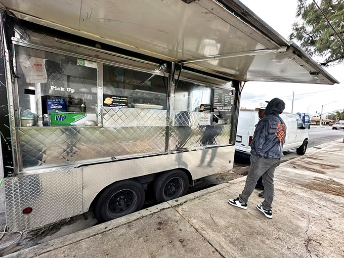 The truck in its natural habitat, serving up authentic flavors under California's perfect blue skies daily.