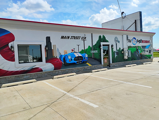 The exterior mural celebrates Main Street USA with patriotic flair. Even the blue Cobra seems to have pulled over for a taste of Americana.