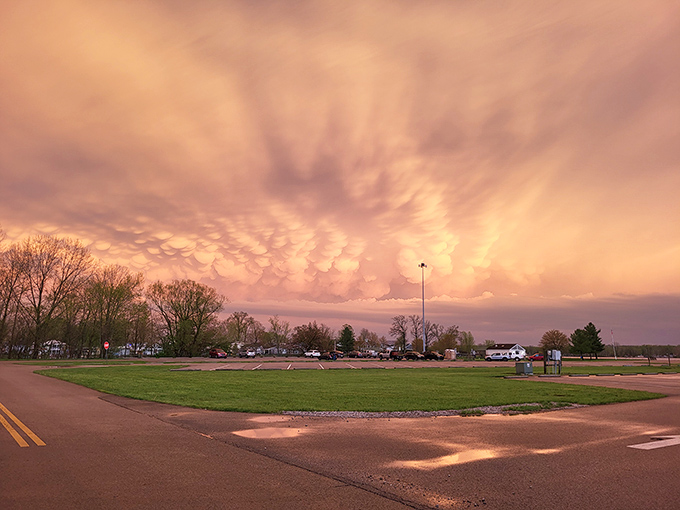 Dramatic skies painting the ordinary extraordinary. Even a simple parking area becomes a cathedral of clouds when Ohio decides to show off.