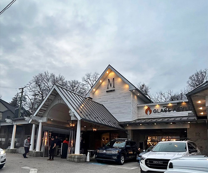 As dusk falls, M Italian's illuminated exterior becomes a beacon for hungry travelers, like a lighthouse guiding ships to safe harbor.