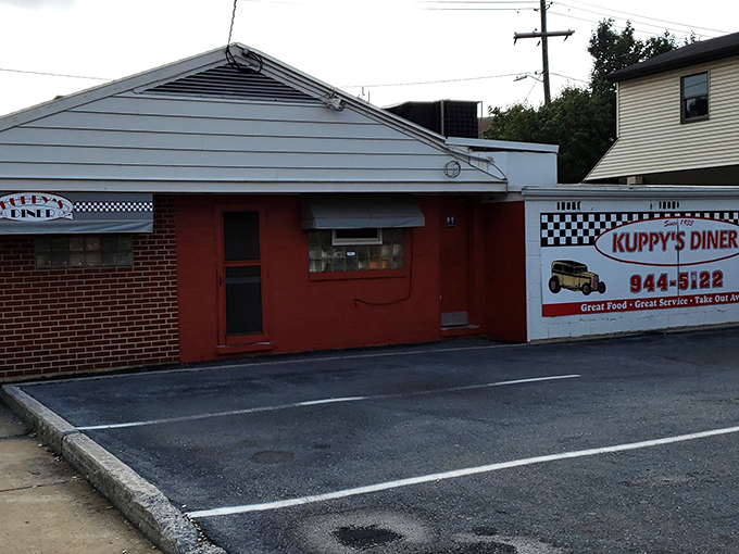 The parking area might not be fancy, but it's where hungry travelers take their first steps toward breakfast enlightenment.