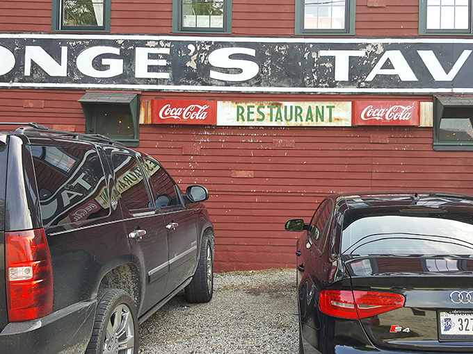Even the parking area tells a story&mdash;luxury vehicles parked on gravel outside a humble tavern, proof that great food transcends all social boundaries.